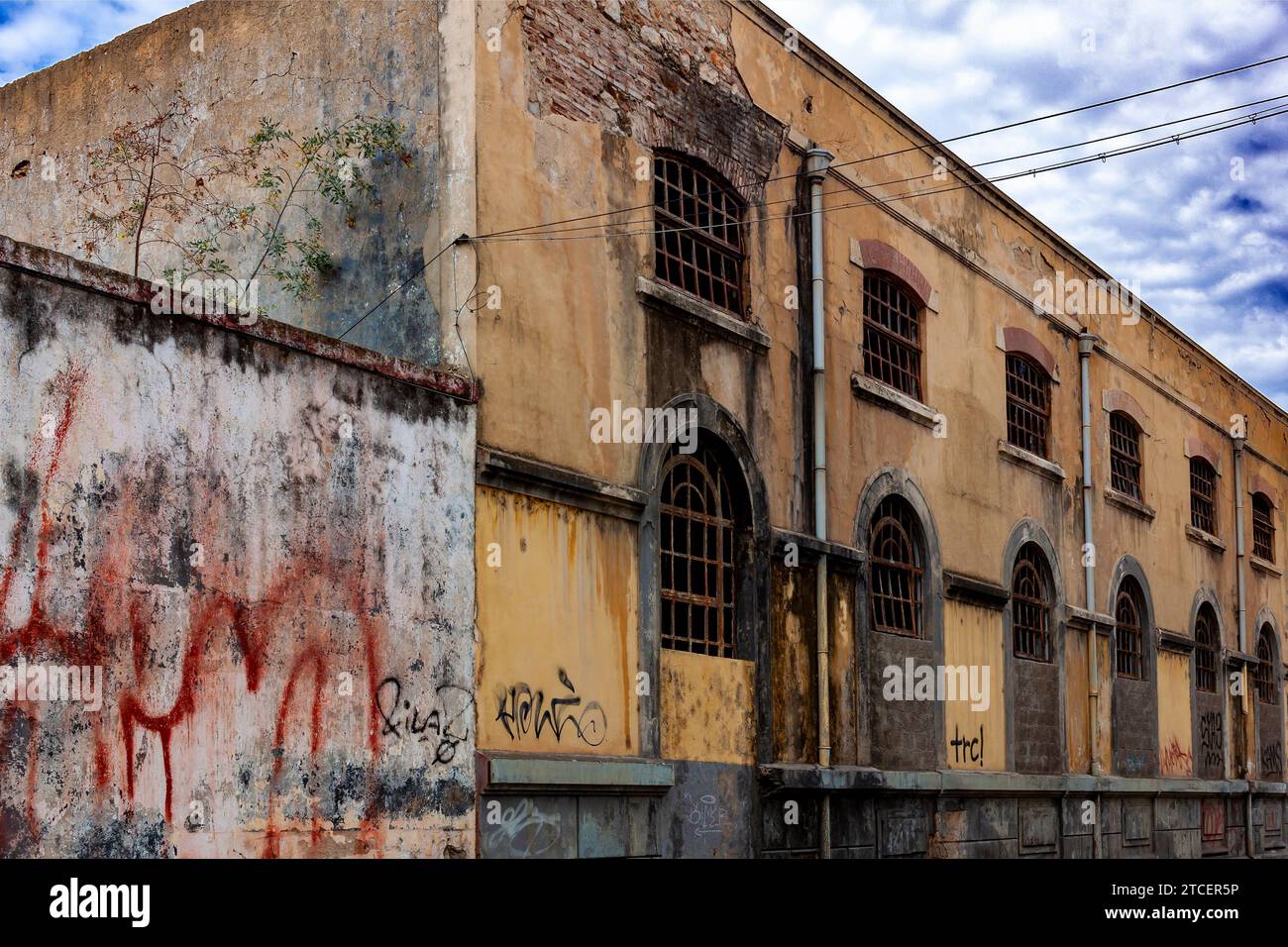 Old rundown flour mill factory in Faro, Algarve, Portugal Stock Photo ...