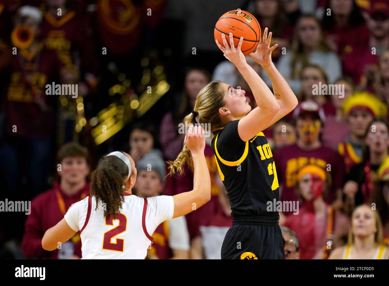 Iowa guard Kate Martin shoots over Iowa State guard Arianna Jackson (2 ...