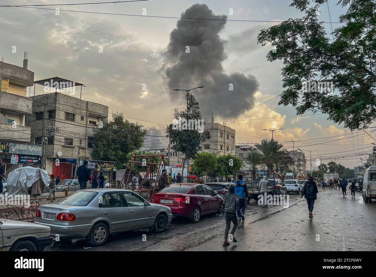 Rafah, Palestinian Territories. 12th Dec, 2023. Smoke rises following ...