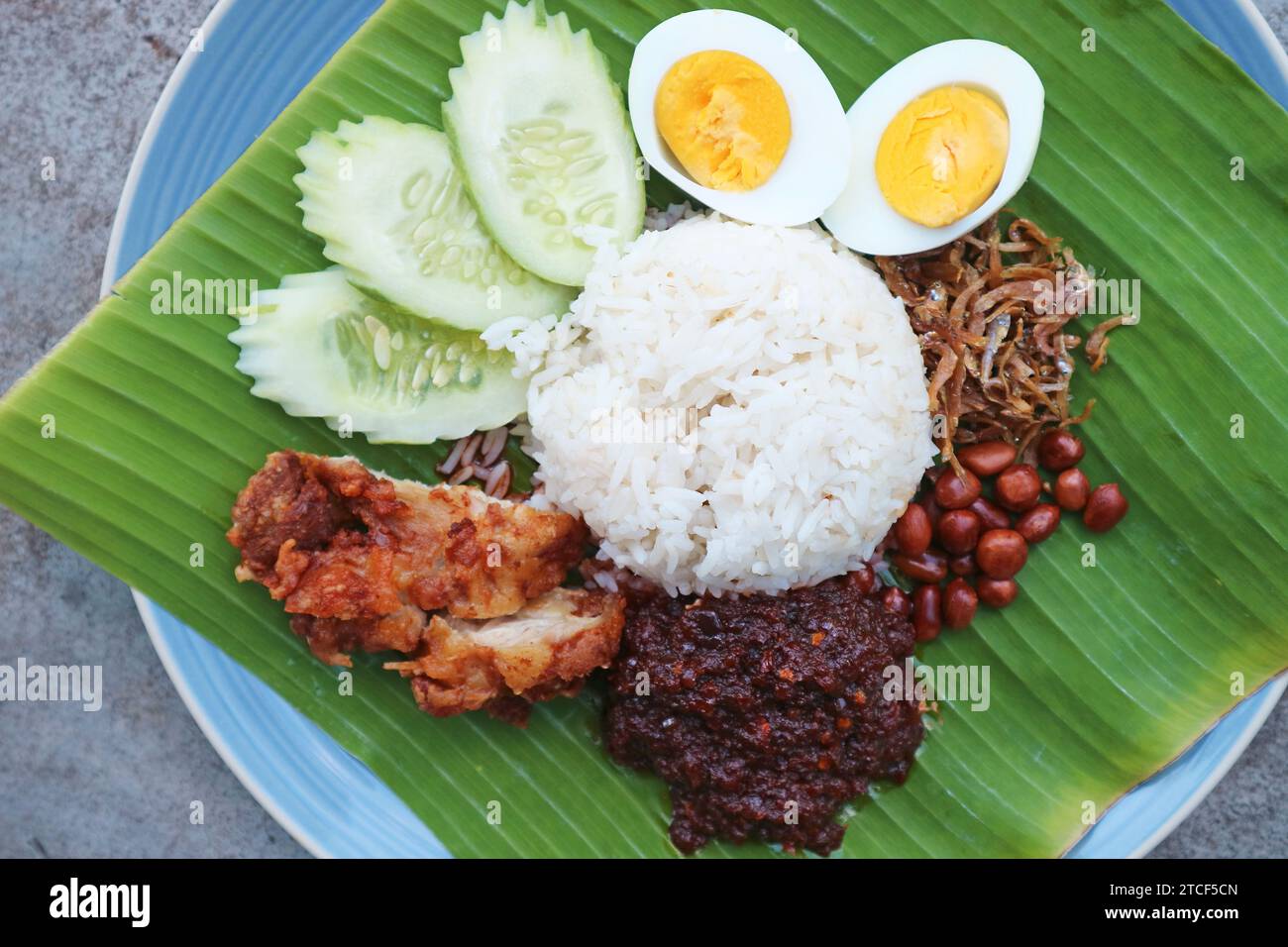 Nasi Lemak, a Popular Traditional Breakfast Dish in Southeast Asia ...