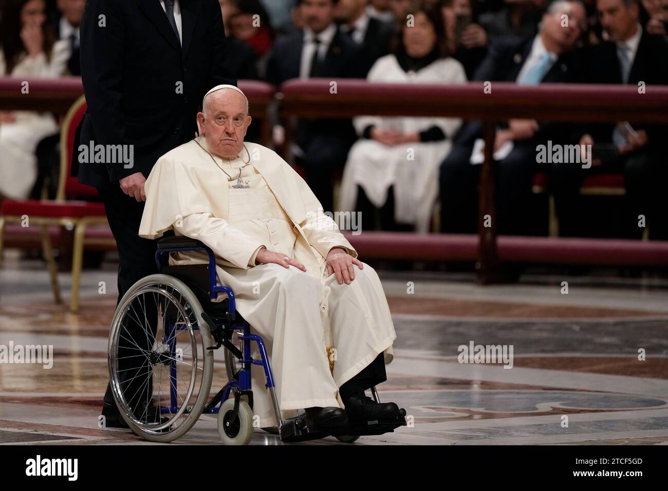 Pope Francis arrives in St. Peter's Basilica to attend a mass for the ...