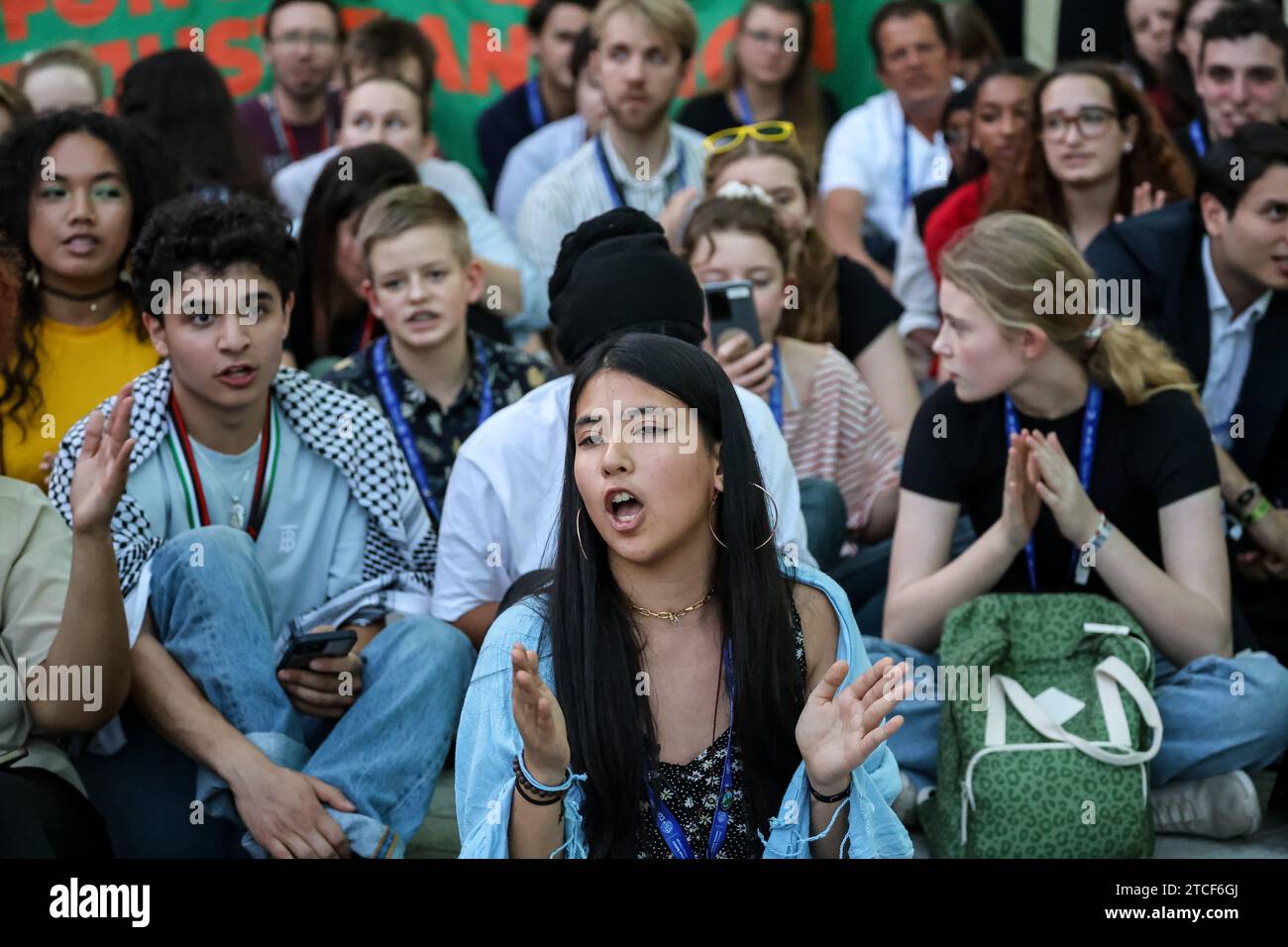 Young activists protest on the last day of COP28, UN Climate Change ...