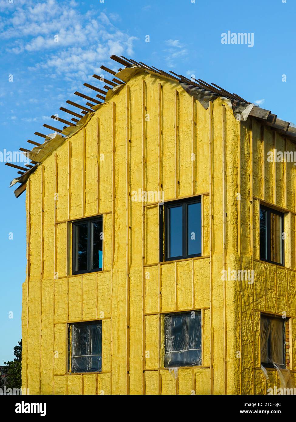 The facade of the residential house sprayed with a layer of ...