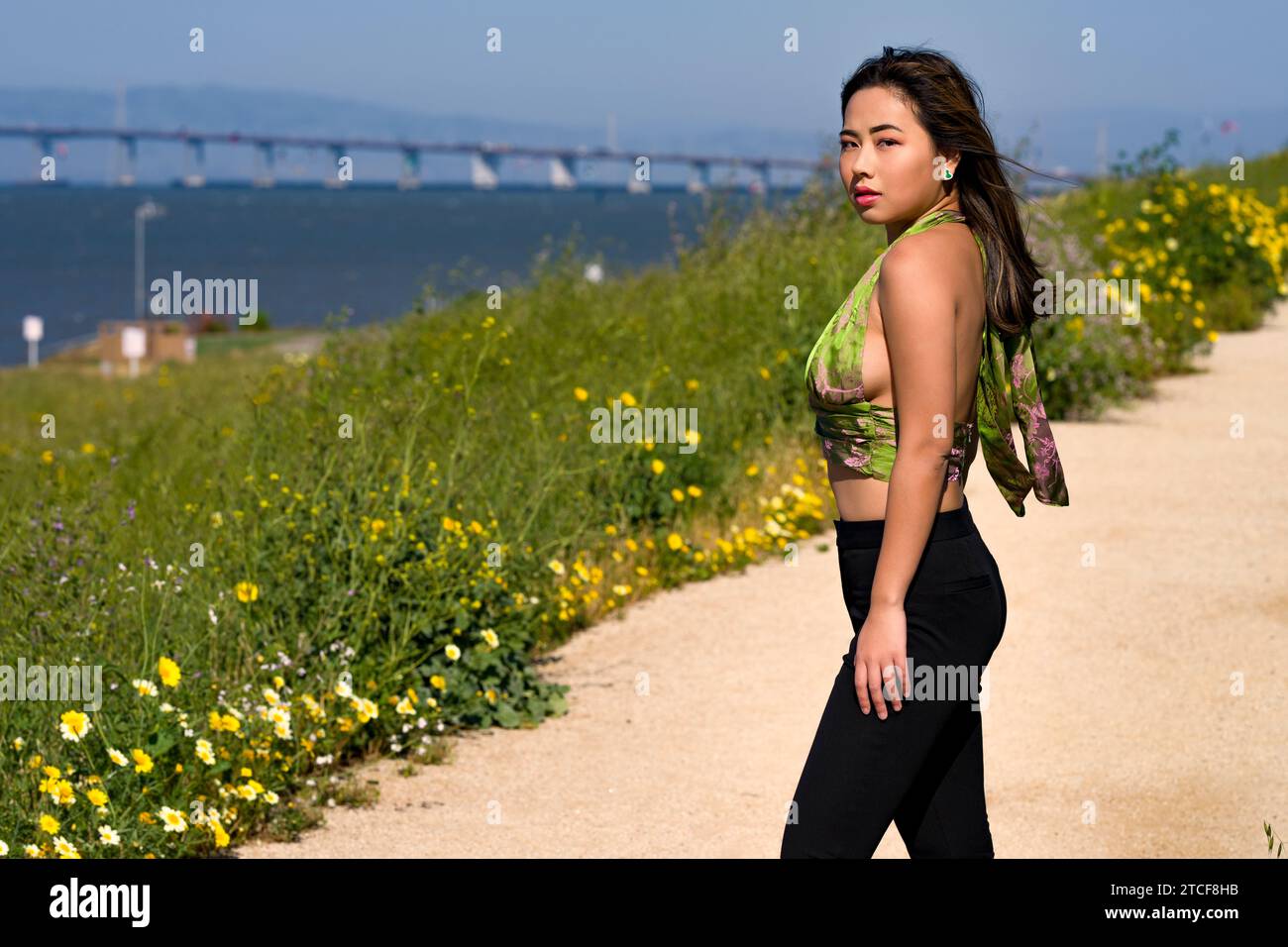 Windy Wind Blown Young Asian Woman Curvy Athletic Standing with San Francisco Bay in the ...