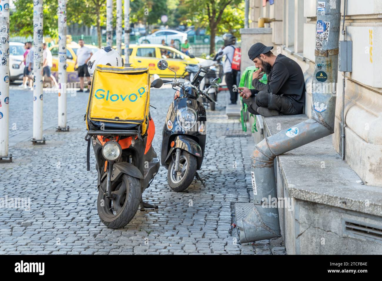 Bucharest, Romania - August 17 2023: Glovo food delivery courier ...
