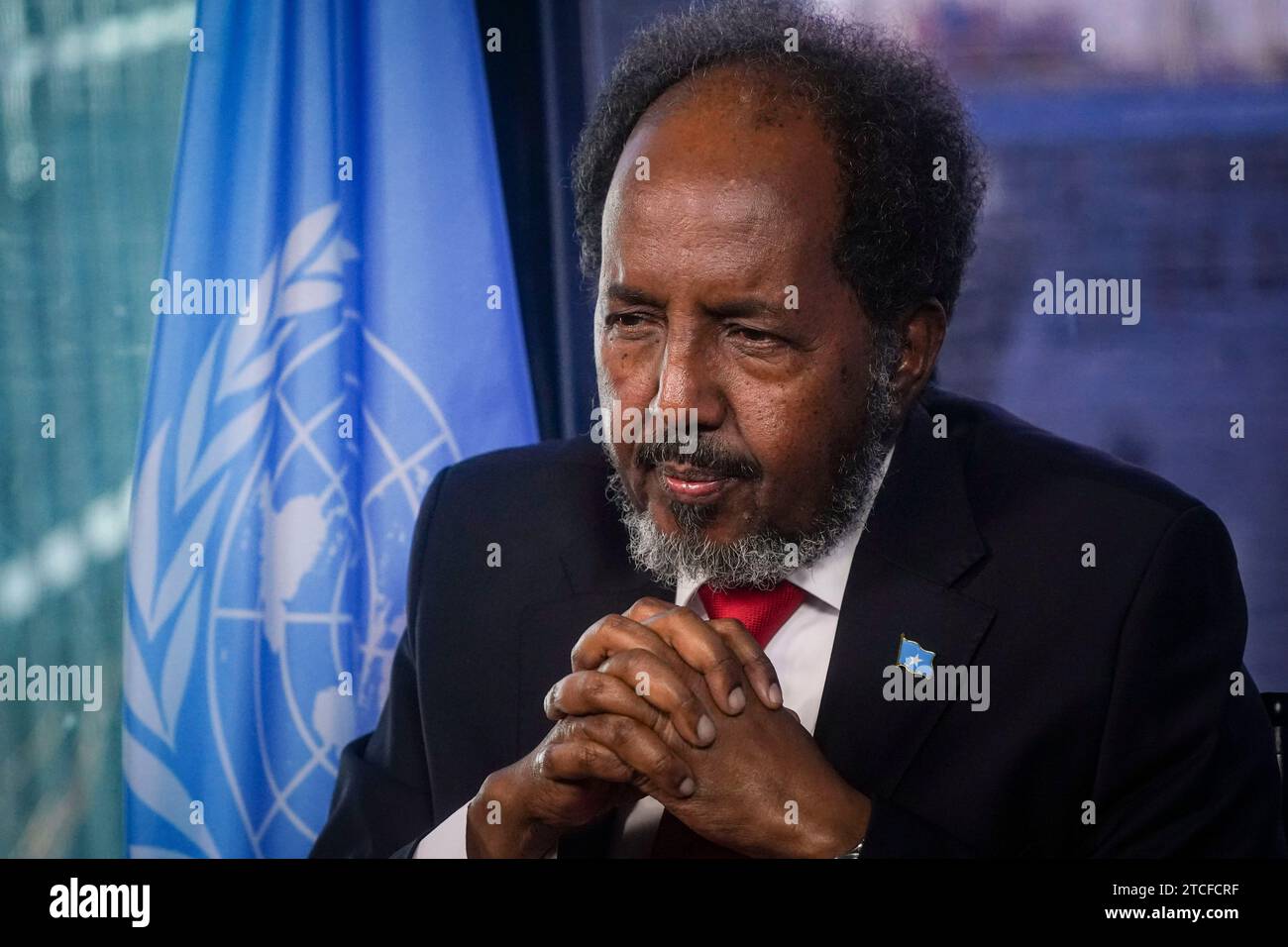 Somalia's President Hassan Sheikh Mohamud listens during an interview ...