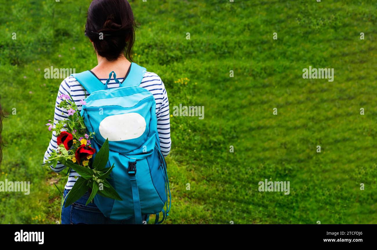 Blue tourist backpack on the traveler girl's back.Concept of active ...