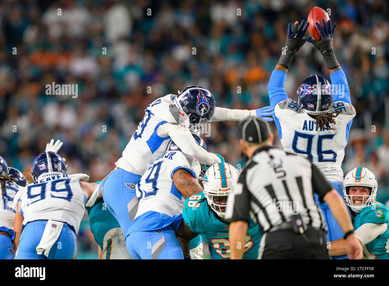Tennessee Titans defensive lineman Denico Autry (96) blocks a field ...