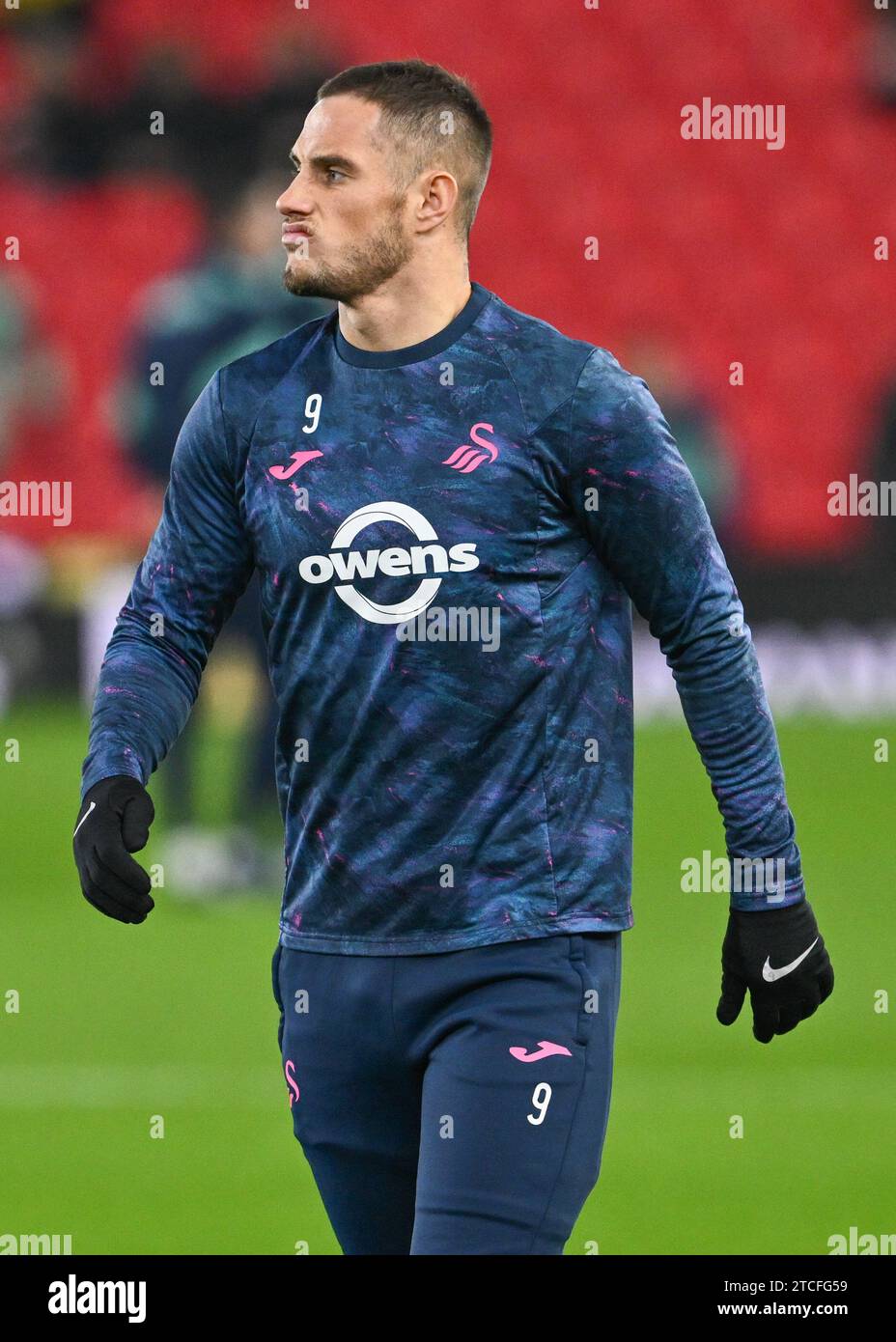 Jerry Yates #9 of Swansea City warms up ahead of the match, during the ...