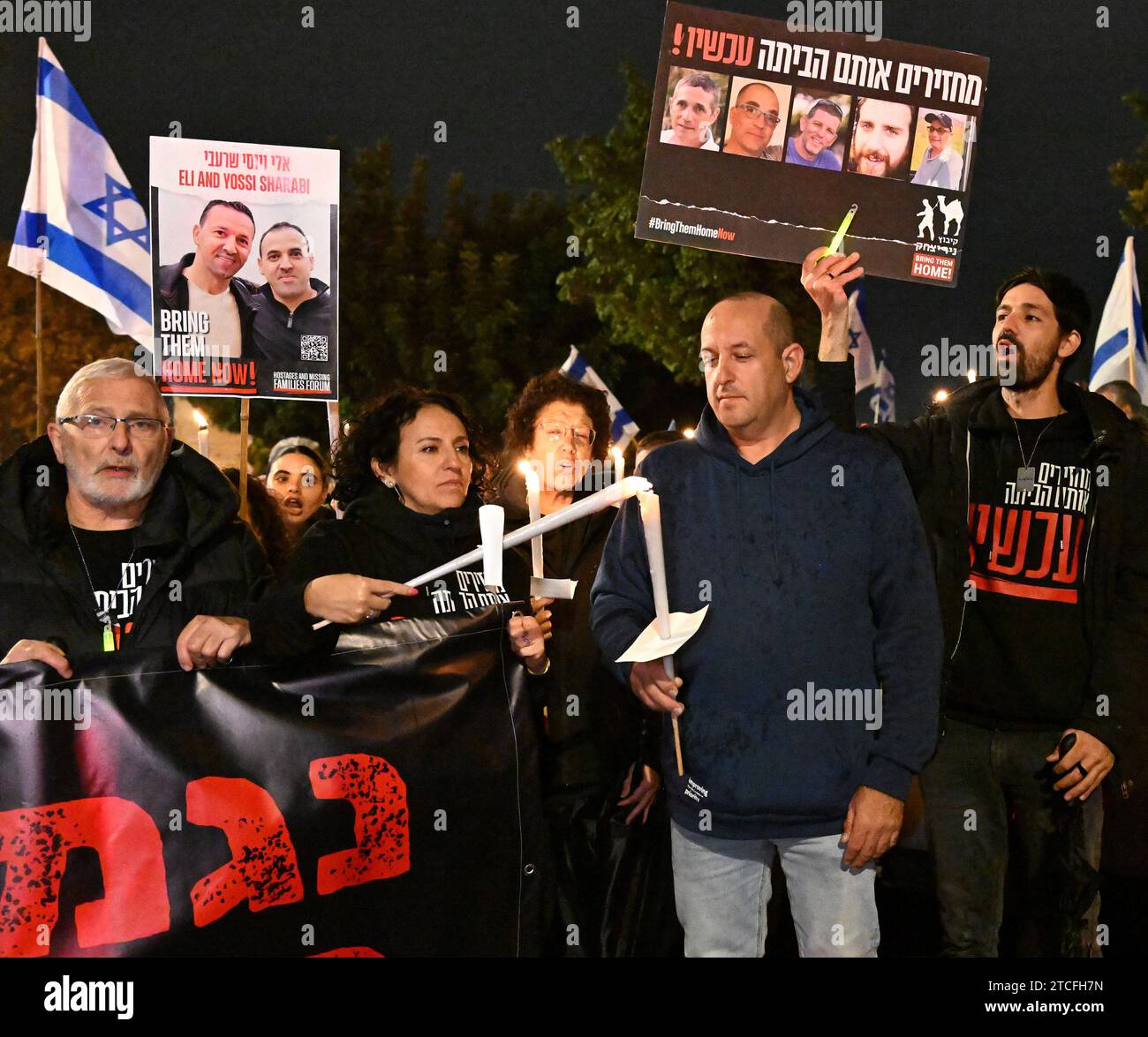 Jerusalem, Israel. 12th Dec, 2023. Families of Israeli hostages carry ...