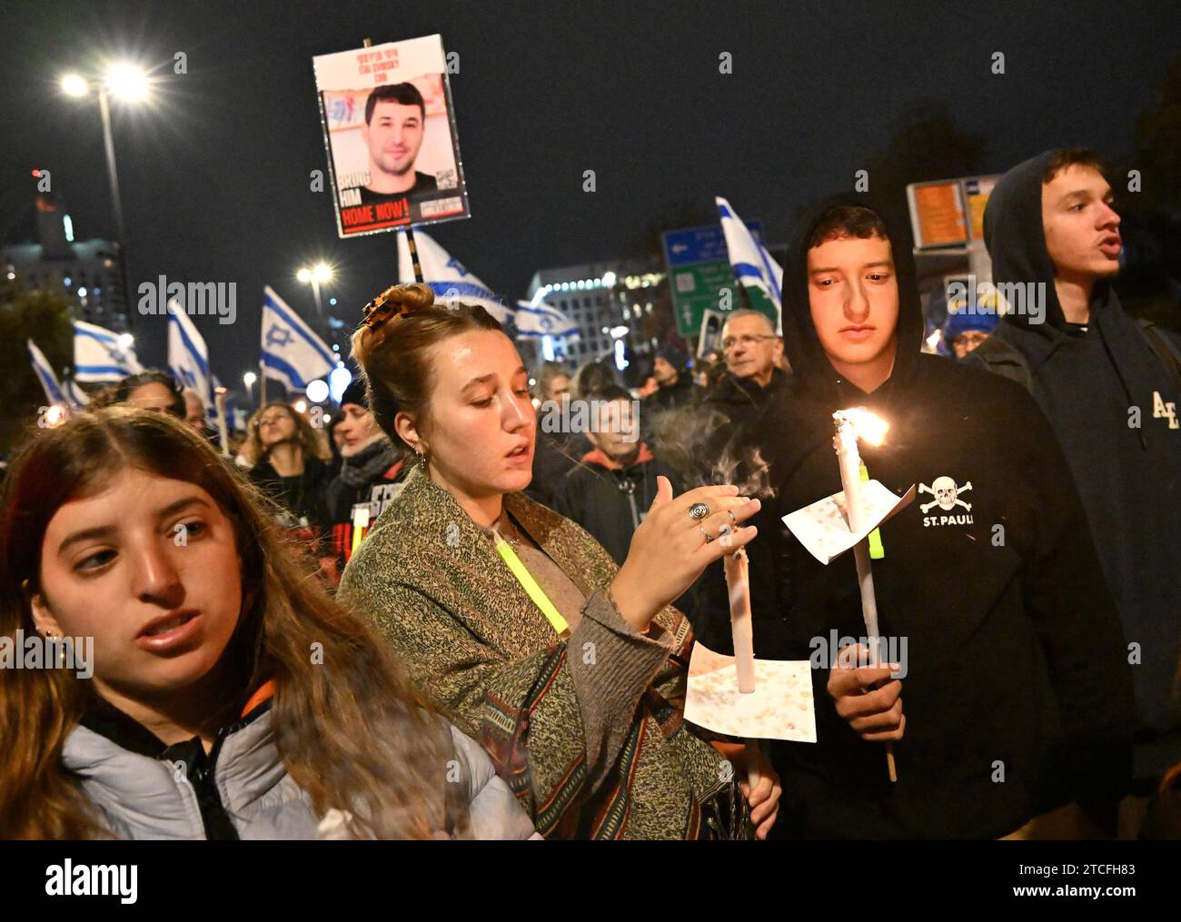 Jerusalem, Israel. 12th Dec, 2023. Families of Israeli hostages carry ...