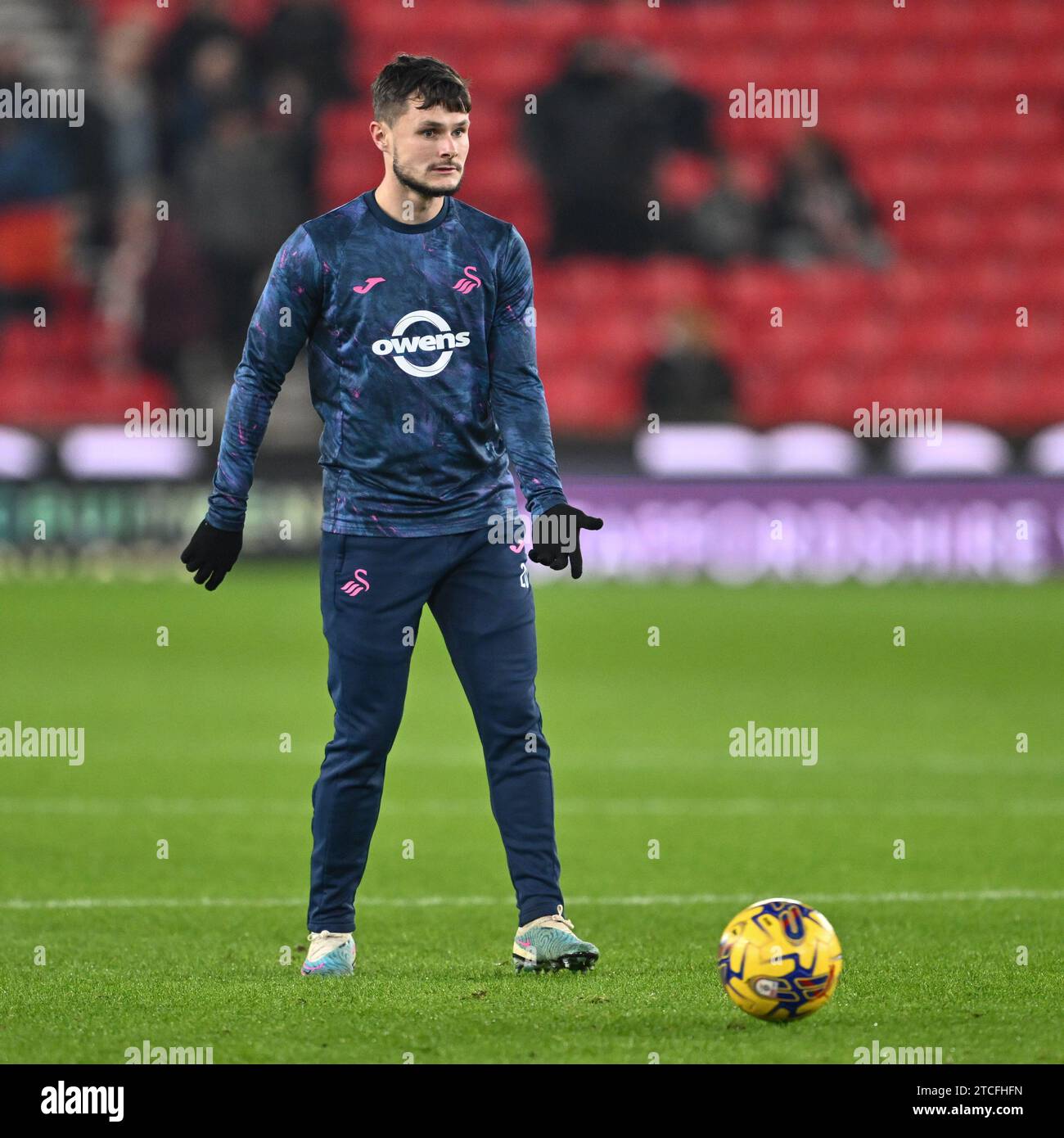 Liam Cullen #20 of Swansea City warms up ahead of the match, during the ...