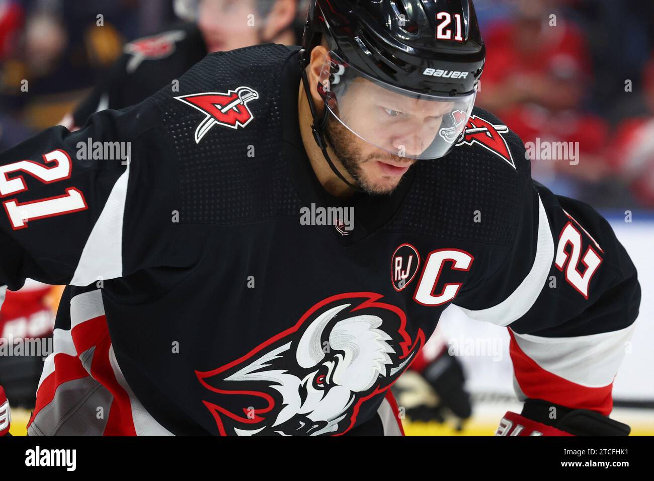 Buffalo Sabres right wing Kyle Okposo (21) lines up for a faceoff ...