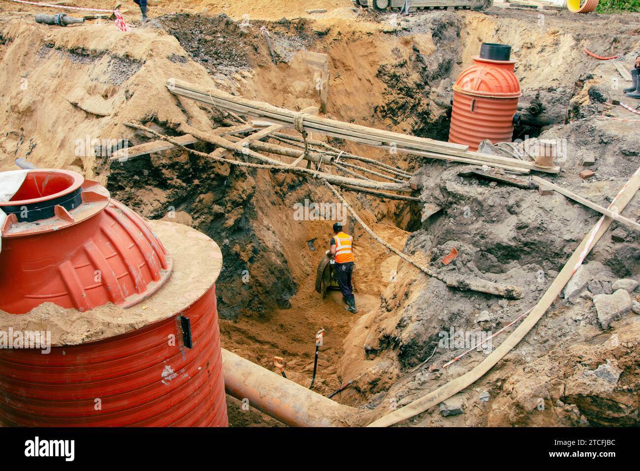 Aerial view of the installation of an underground urban sewerage and ...
