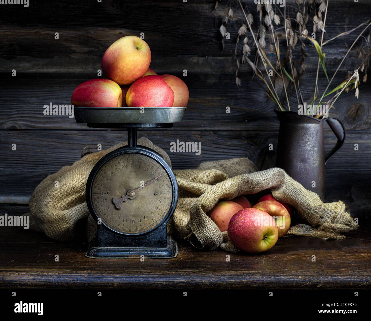 Still life with apples on a vintage scale Stock Photo - Alamy