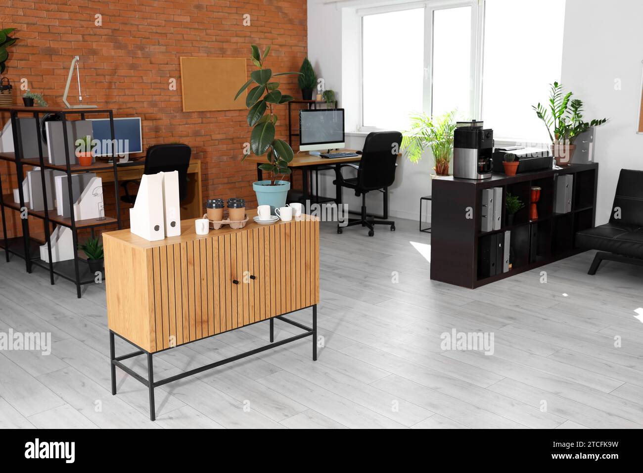 Interior of modern office with coffee machine and workplaces Stock ...