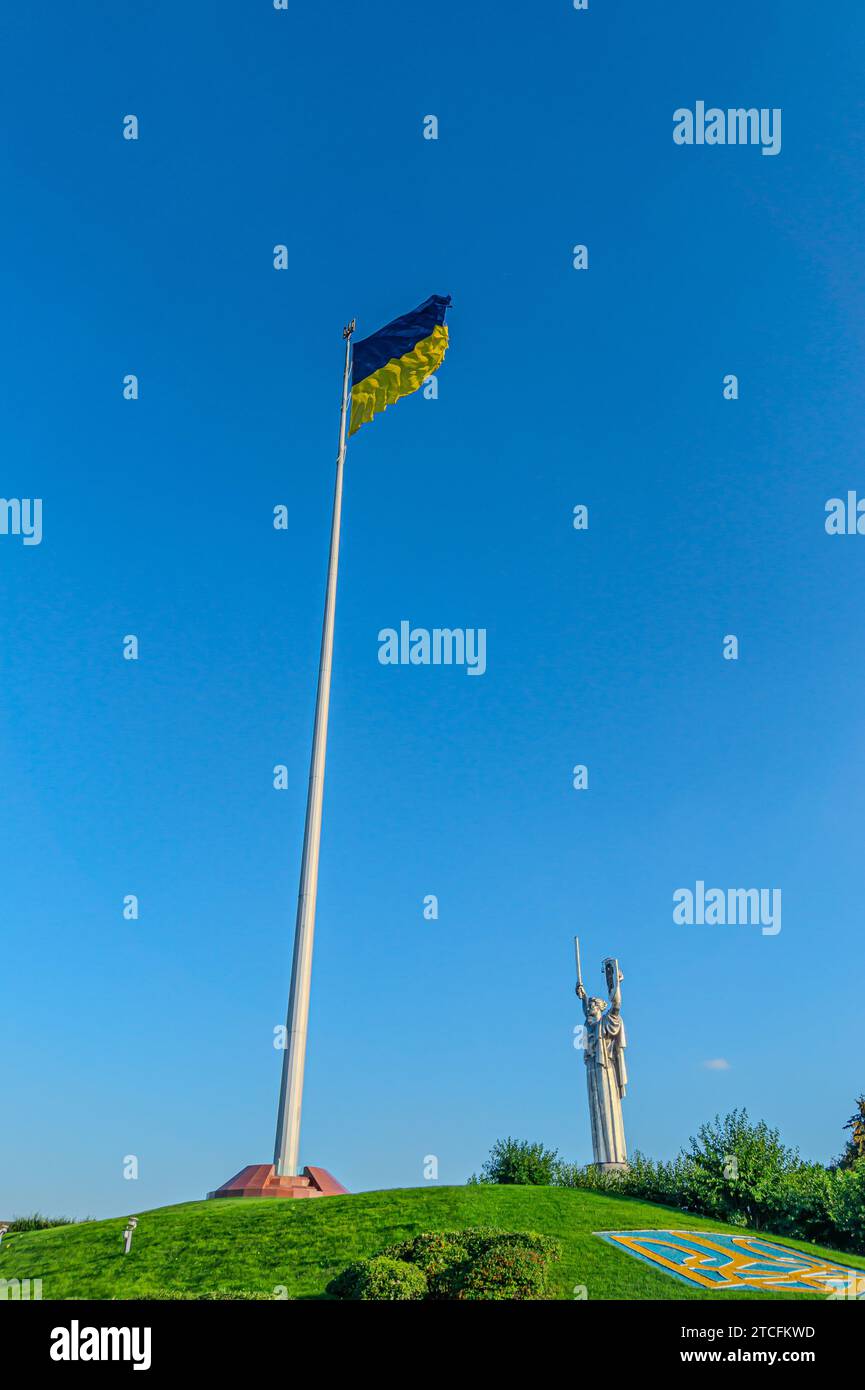 Emblem of Ukraine. Ukraine flag large national symbol fluttering in ...