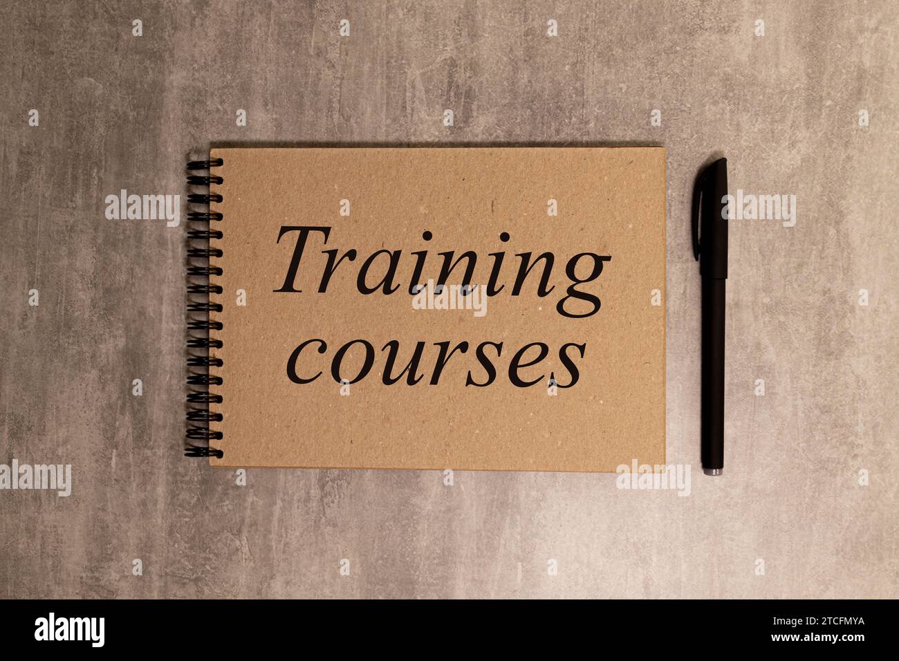 Training Courses text on notepad, concept background Stock Photo - Alamy