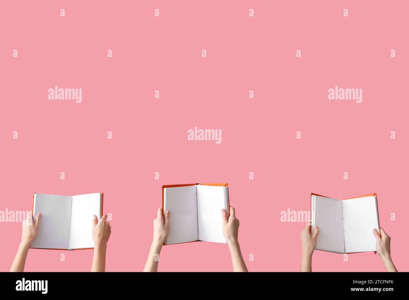 Hands holding open books hi-res stock photography and images - Alamy