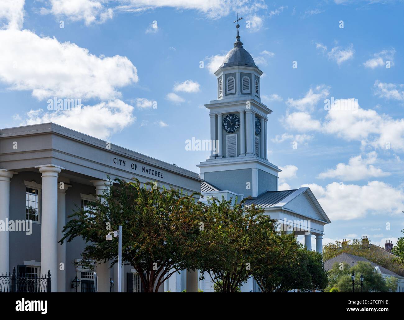 Clock tower of historic First Presbyterian church with the City of ...