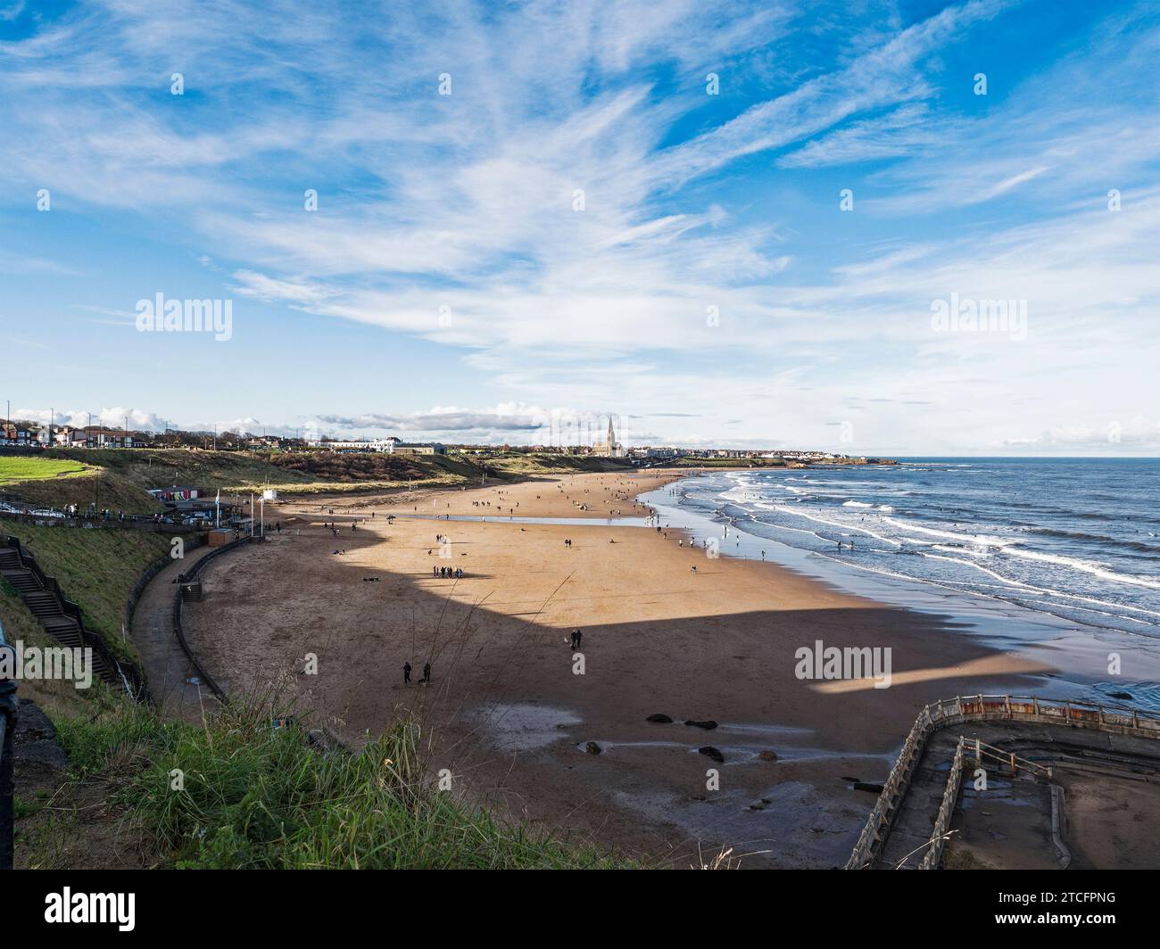 View over Tynemouth Longsands beach in North tyneside, UK with the ruin ...