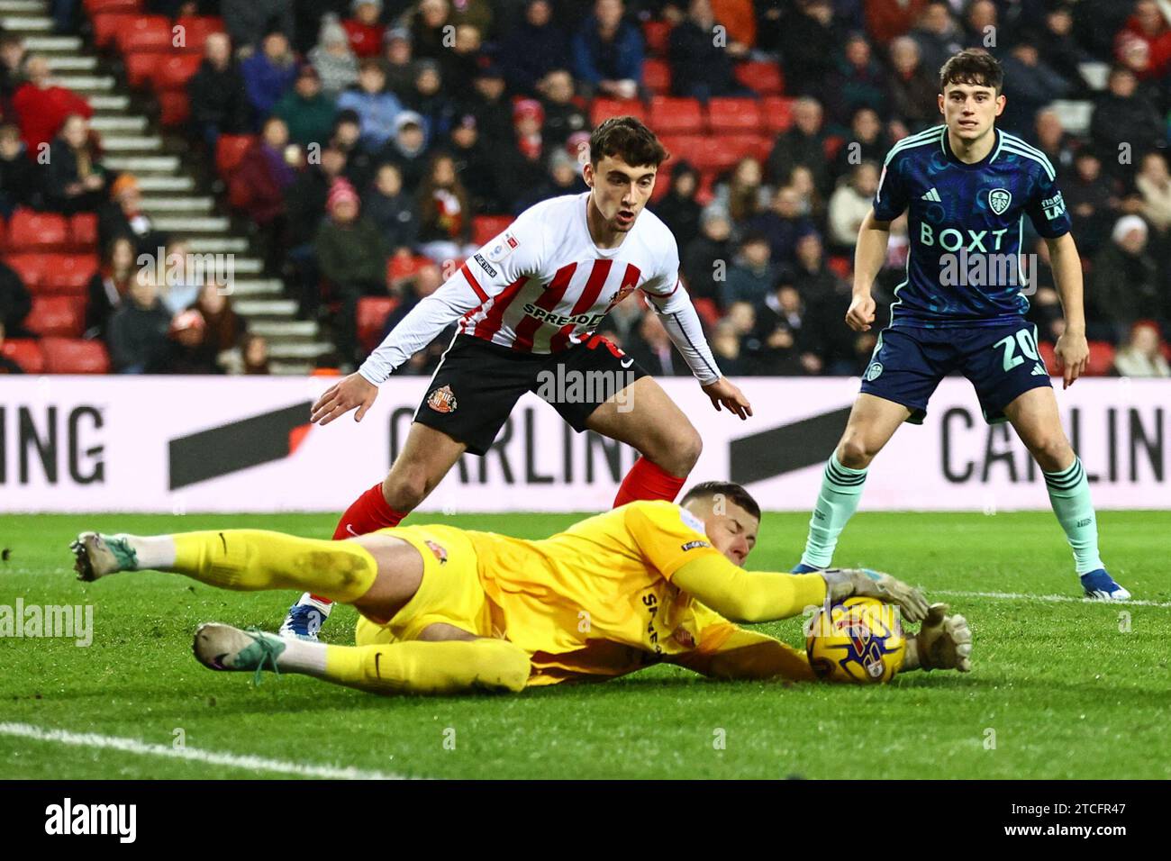 Anthony Patterson #1 of Sunderland saves a shot from Georginio Rutter ...