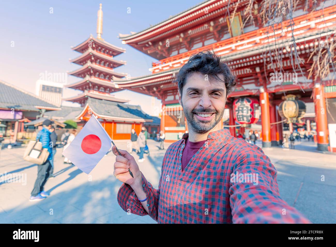 Handsome young tourist enjoying summer holiday in Tokyo, Japan ...