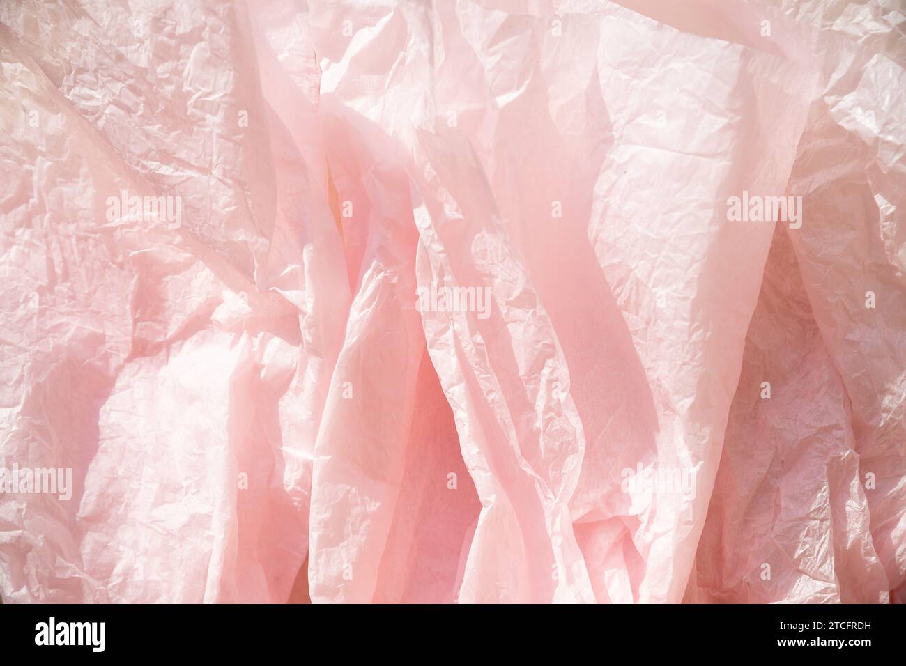 deep rose colored crumpled paper texture background for design ...