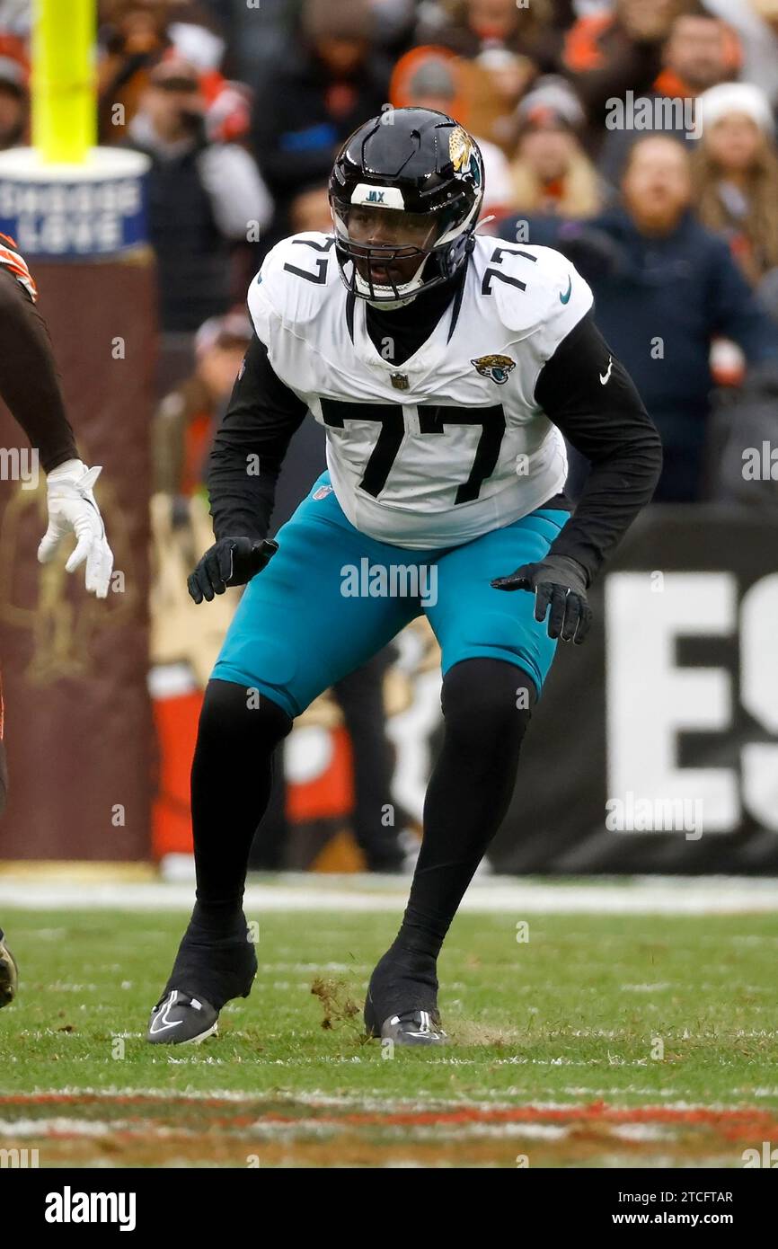 Jacksonville Jaguars offensive tackle Anton Harrison (77) looks to make ...