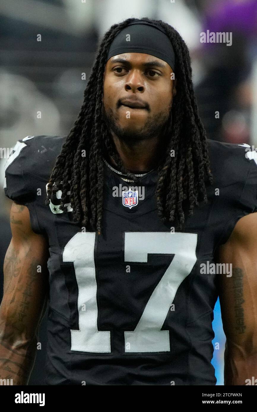 Las Vegas Raiders wide receiver Davante Adams (17) leaves the field ...