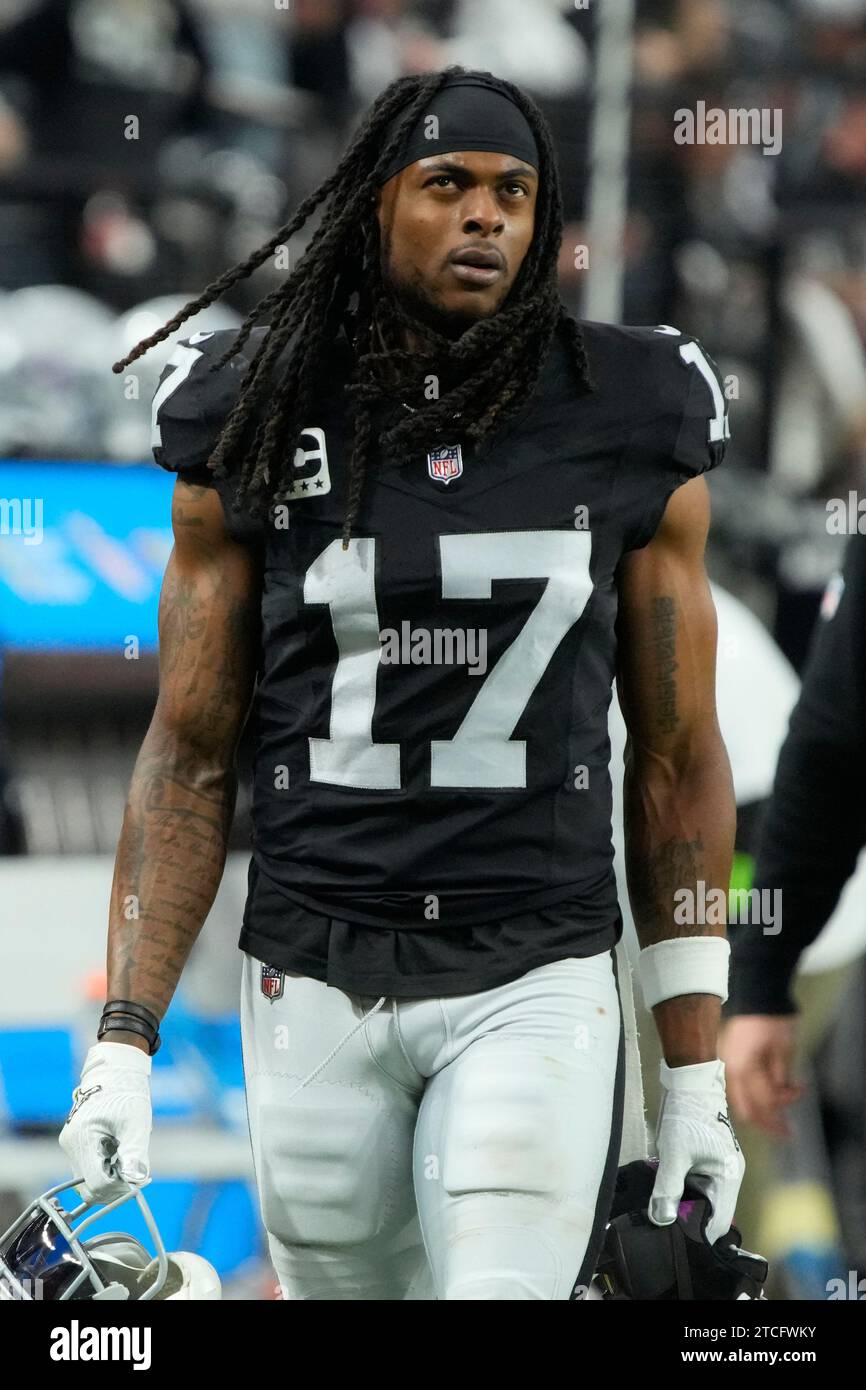 Las Vegas Raiders wide receiver Davante Adams (17) leaves the field ...