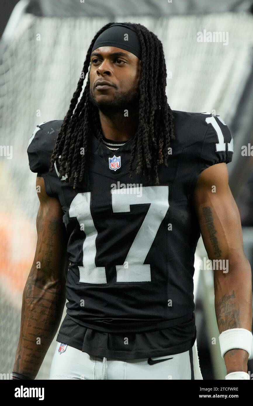Las Vegas Raiders wide receiver Davante Adams (17) leaves the field against the Minnesota ...