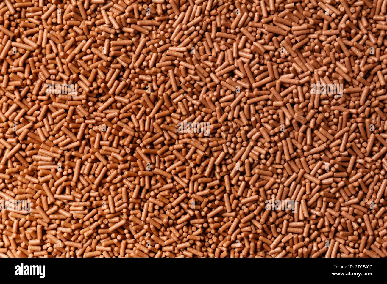 Chocolate chip background close-up, milk chocolate chip as abstract ...