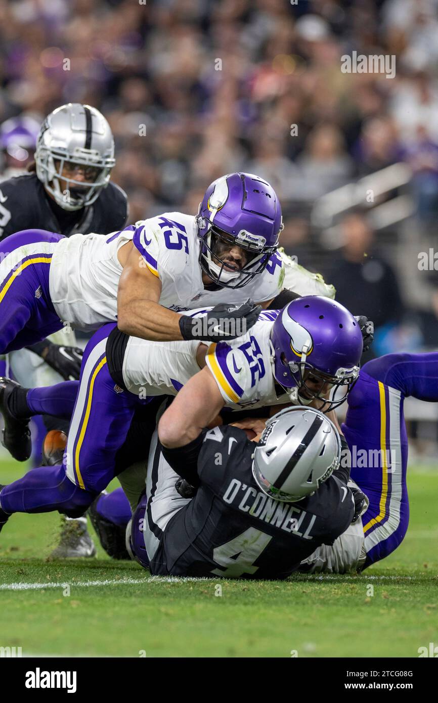 Las Vegas Raiders quarterback Aiden O'Connell (4) is sacked by ...