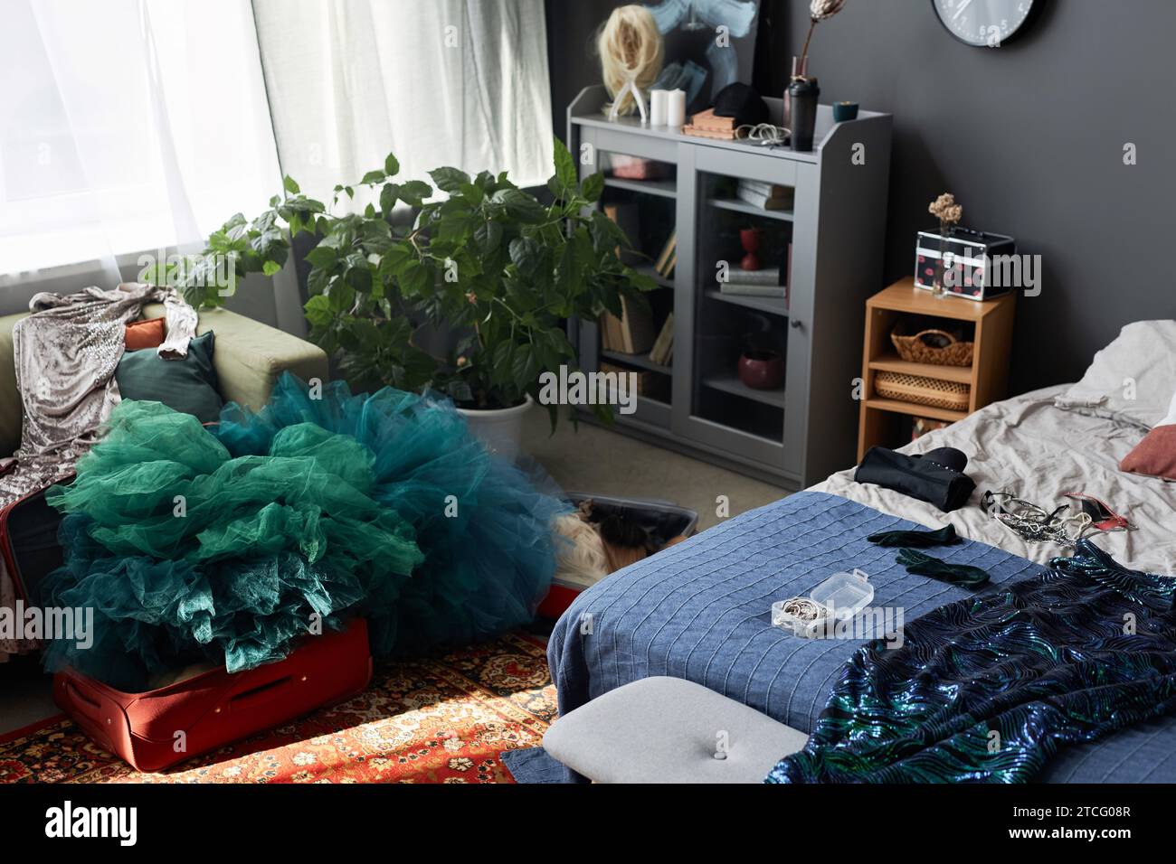 Background image of messy performers room with costumes and makeup ...