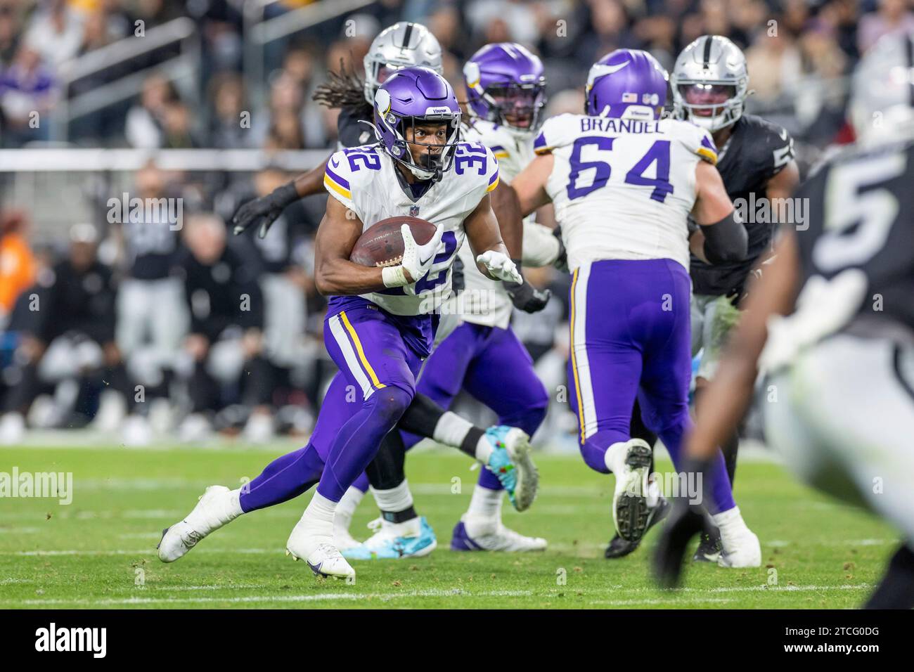 Minnesota Vikings running back Ty Chandler (32) runs the ball against ...