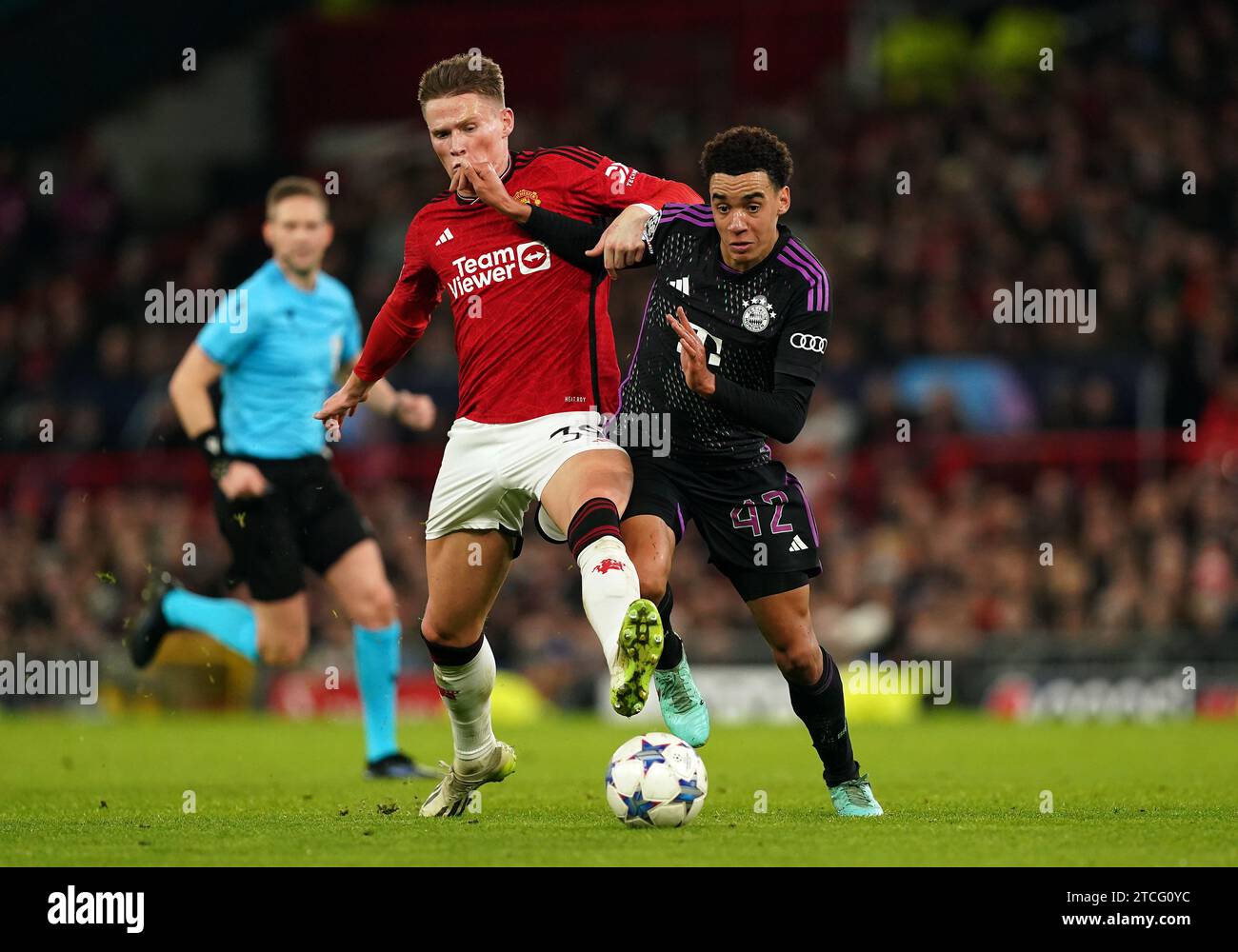 Manchester United's Scott McTominay and Bayern Munich's Jamal Musiala ...