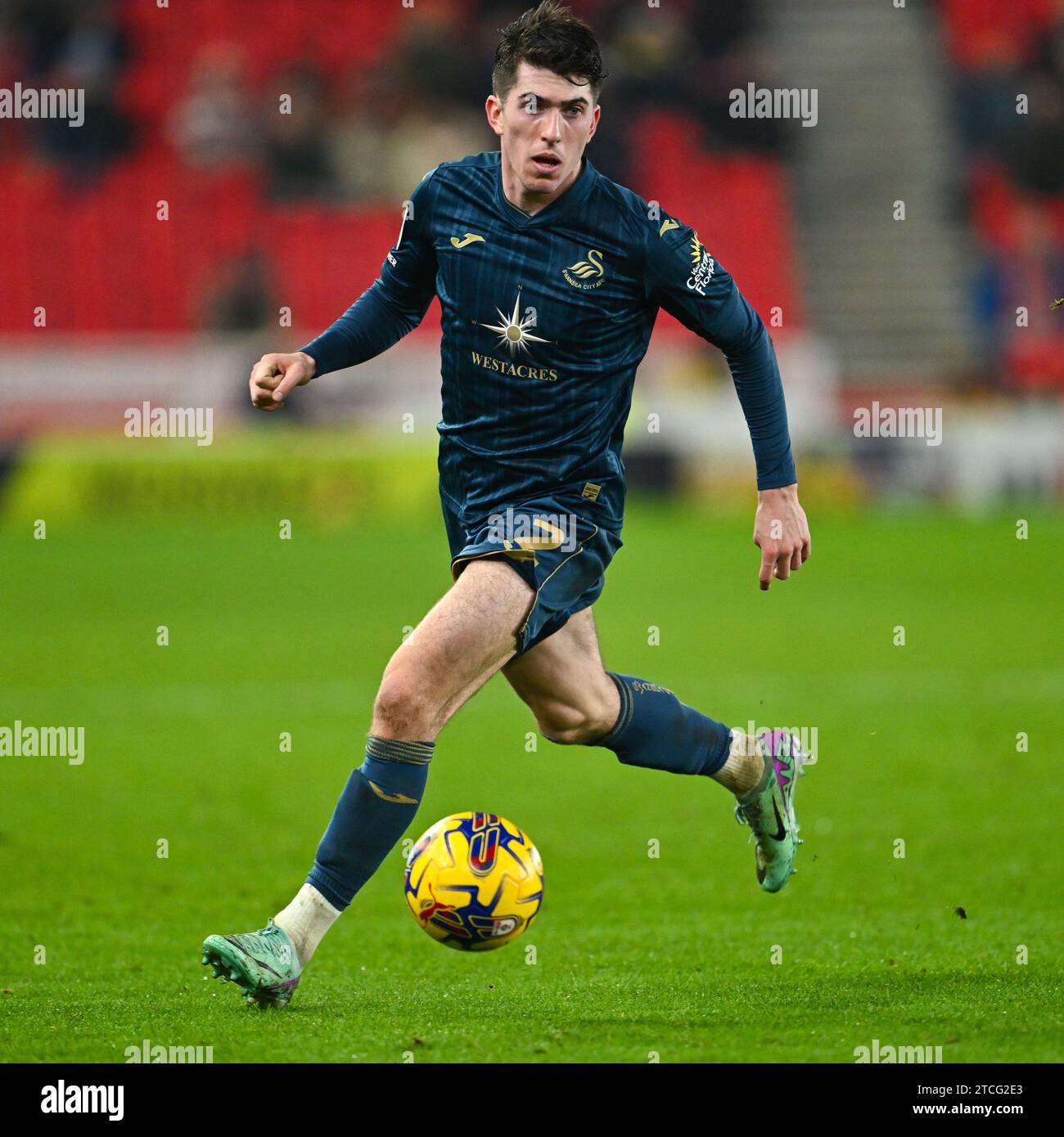 Stoke On Trent, UK. 12th Dec, 2023. Josh Key #2 of Swansea City breaks ...