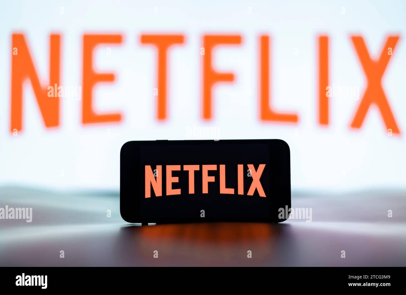 In this photo illustration, the Netflix logo is seen displayed on a ...