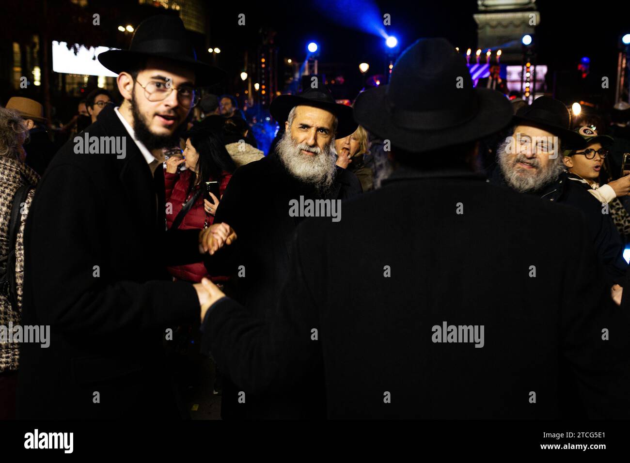 Jewish men seen dancing during the Hanukkah festivities at Place de ...