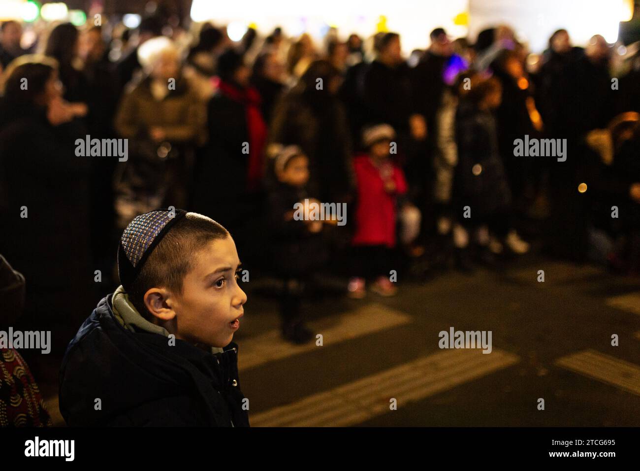A Jewish kid with kippah seen during the Hanukkah festivities. The ...