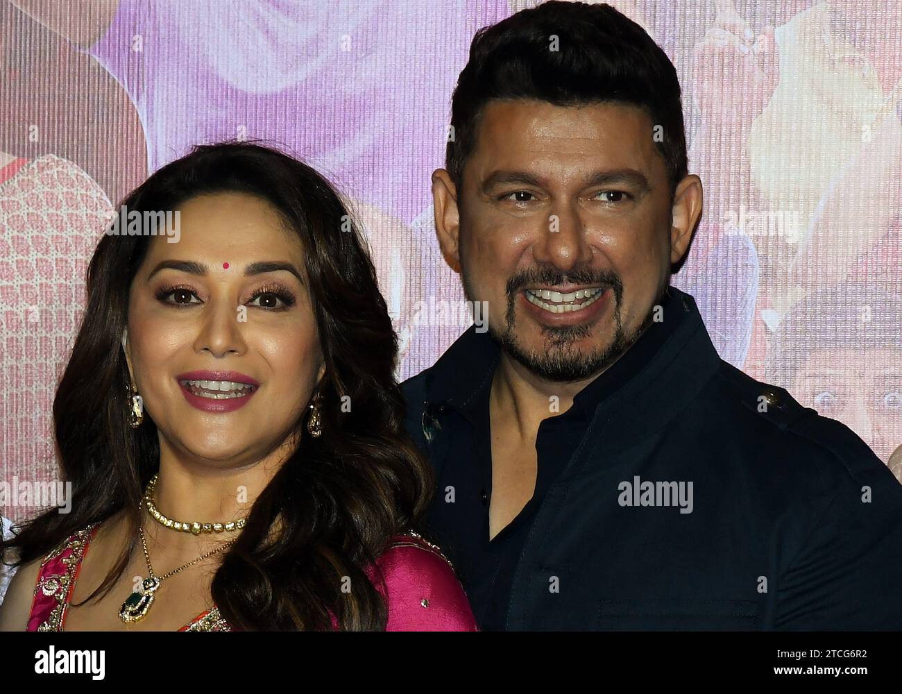 Mumbai, India. 12th Dec, 2023. L-R Bollywood actress Madhuri Dixit Nene and her husband Shriram ...