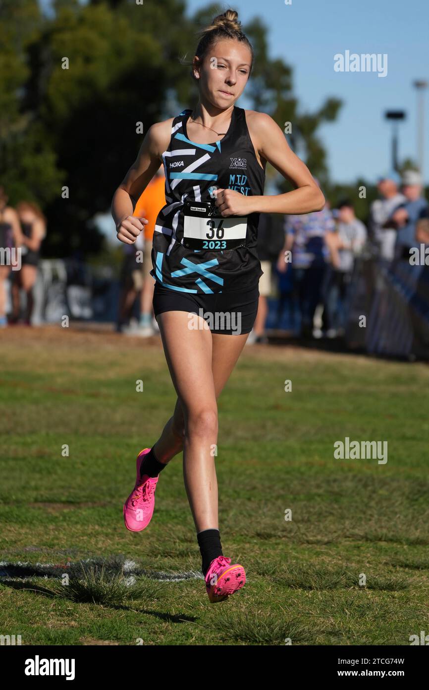 Payton Meineke places 16th in the girls race in 18:08.4 during the Foot ...