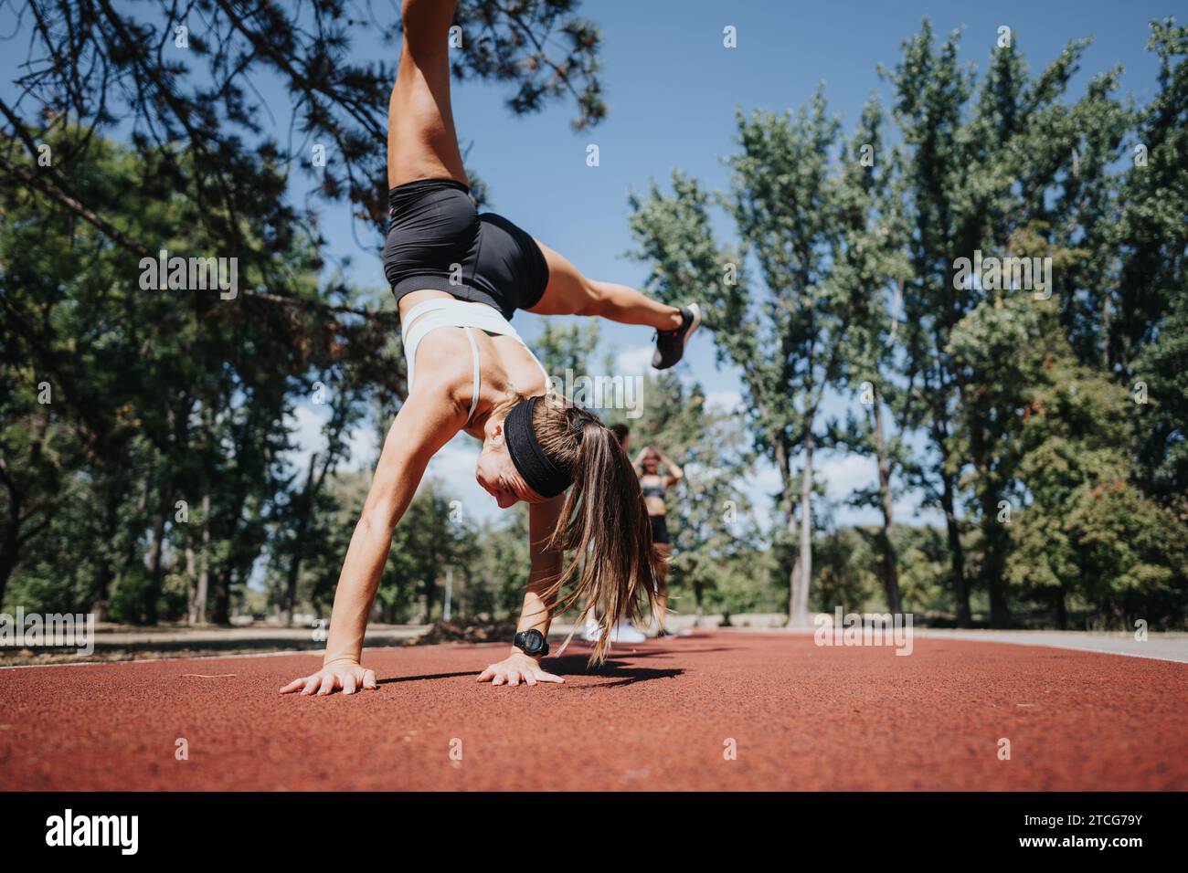 Girl doing a cartwheel hi-res stock photography and images - Alamy