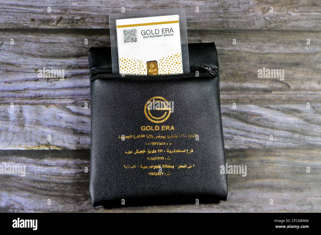 Cairo, Egypt, December 10 2023: Gold Era 24 Karate pure yellow gold bar ...