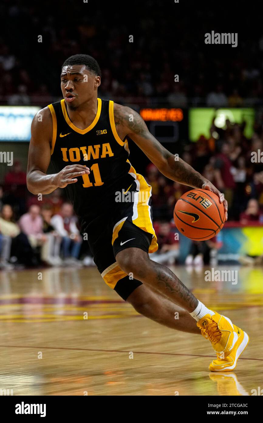 Iowa guard Tony Perkins (11) drives to the basket during the first half ...