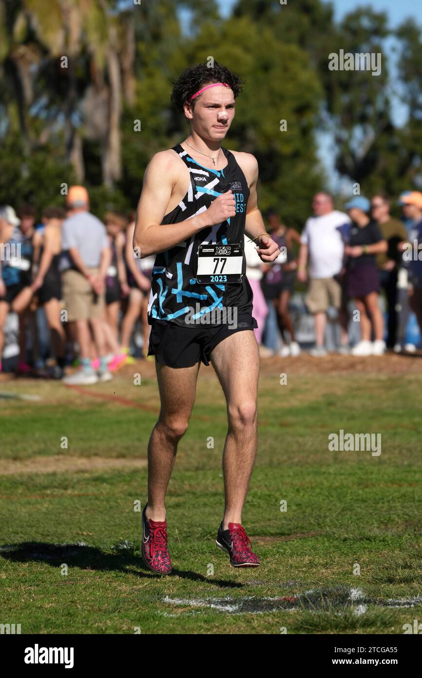 Benjamin Anderson places ninth in the boys race in 15:32.1 during the ...