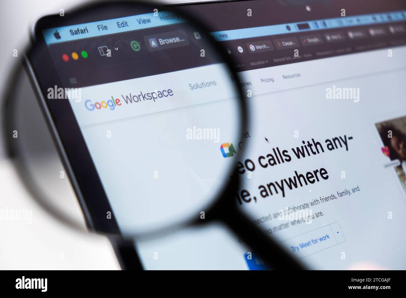 Google Workspace logo on the screen of laptop through magnifying glass, December 2023, Prague ...