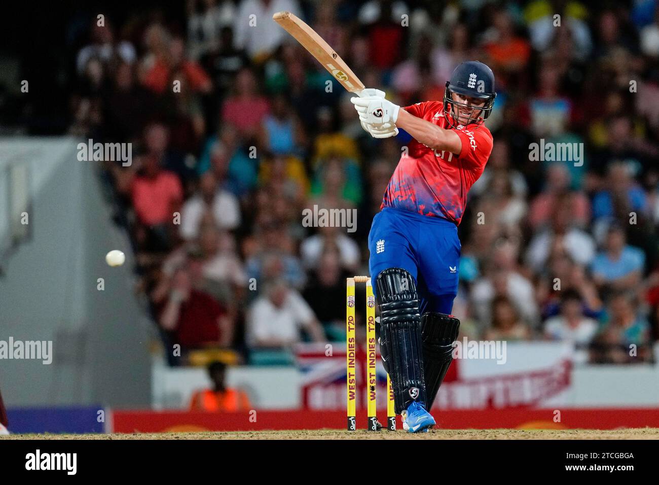 England's Sam Curran hits a four from the bowling of West Indies ...