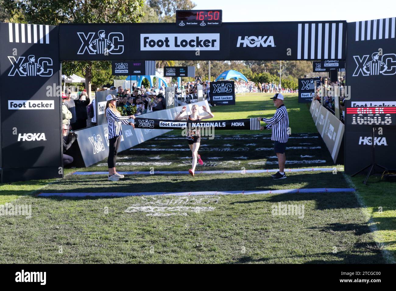 Elizabeth Leachman celebrates after winning the girls race in 16:50.7 ...